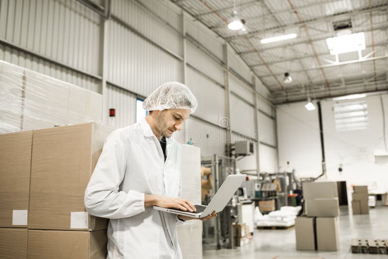 Worker in Warehouse for Food Packaging. Stock Photo - Image of ...