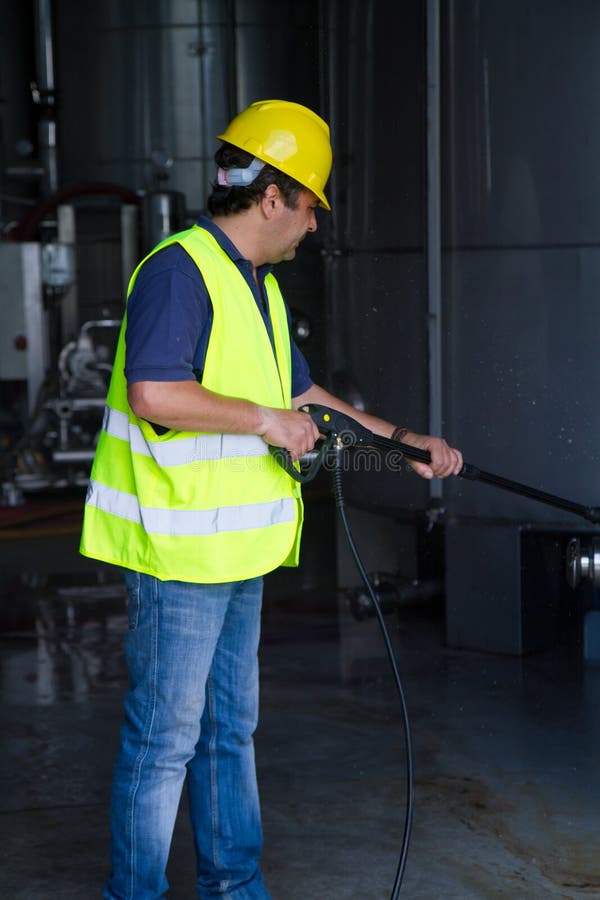 Worker Washing Industrial Site Stock Image - Image of clean, industry ...