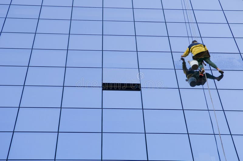 Worker washing windows stock photo. Image of figure, people - 4986670
