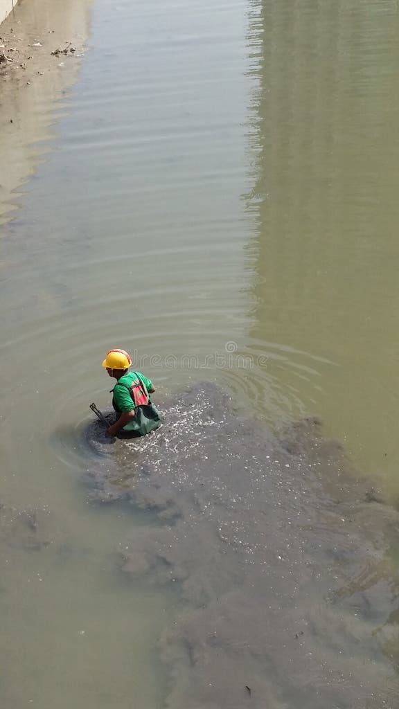 Worker in Water editorial image. Image of worker, river - 47621000