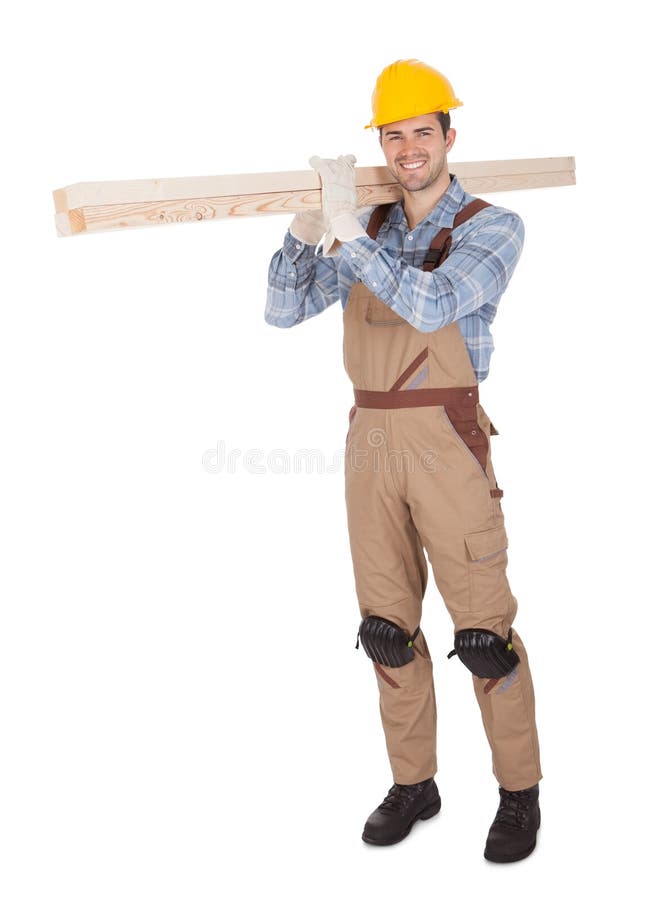 Worker Wearing Hard Hat and Carrying Timber Stock Image - Image of ...
