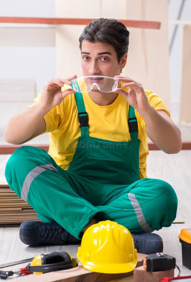 Worker Wearing Protective Goggles at Construction Site Stock Image ...