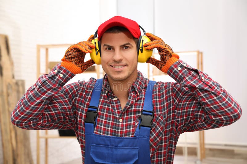 Worker Wearing Safety Headphones Indoors Hearing Protection Device
