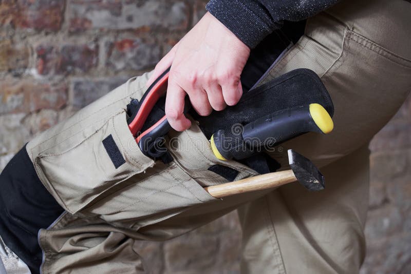 Tools on a pants pocket stock image. Image of instruments - 23964625