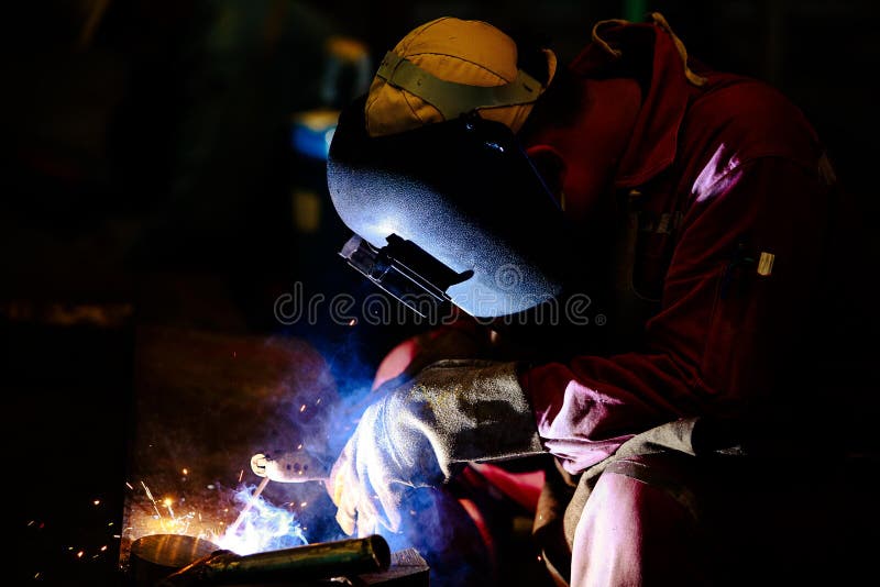 Worker is Weld Plate by Shield Metal Arc Welding Stock Image - Image of ...