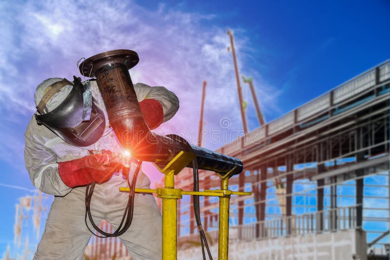 Welder is Welding in Construction Site Stock Photo - Image of flame ...