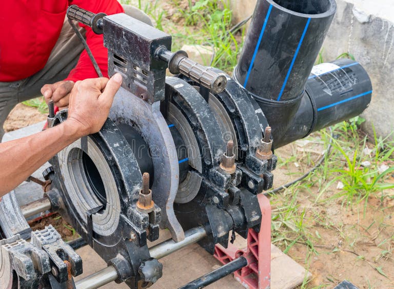 The Worker is Welding HDPE Pipes Using a Fusion Machine Stock Image ...