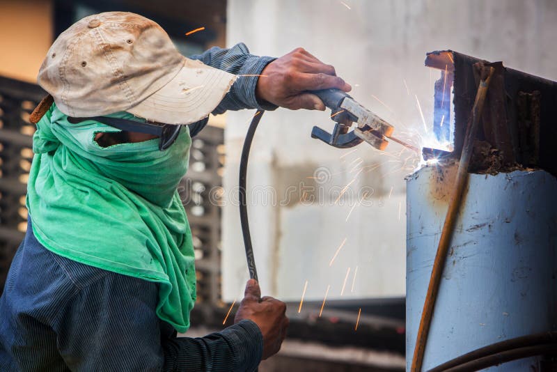 Worker Welding Iron in Construction Site Editorial Image - Image of ...