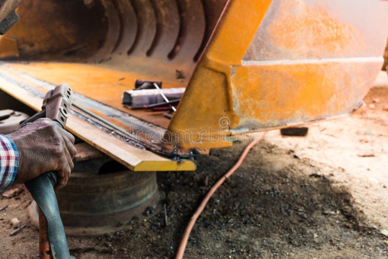 Worker welding stock photo. Image of loader, connect - 98297374