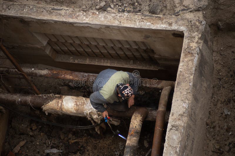 Worker with a Welding Machine Editorial Stock Photo - Image of pipe ...