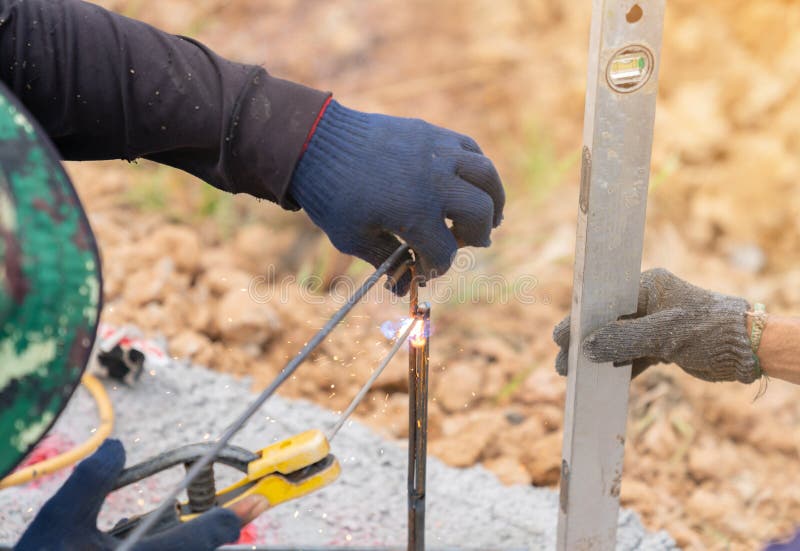Worker Welding and Measurement Level Steel Rod Stock Image - Image of ...