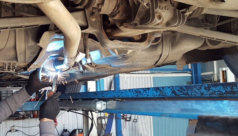 Worker Welding Metal Exhaust Pipe Stock Image - Image of metalwork ...