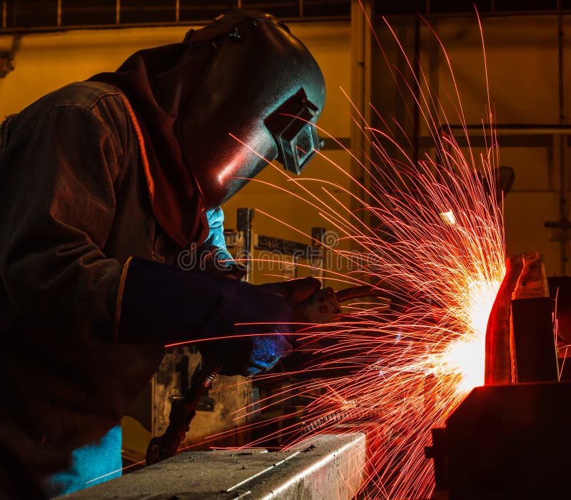 Worker welding metal stock image. Image of production - 63329257