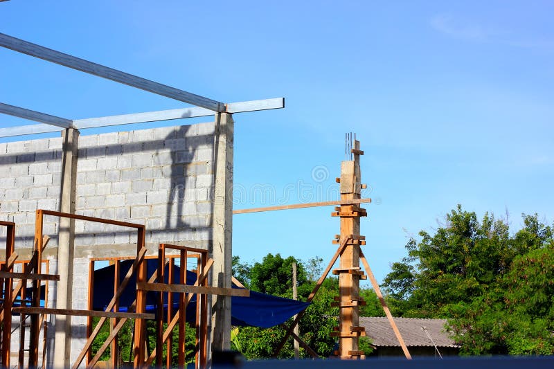 Worker Welding Roof Beams His Shadow on the Wall in Construction Site ...