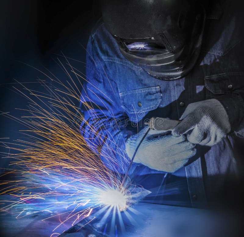 Welder Wearing Protective Face Mask Welding at Work Stock Photo - Image ...