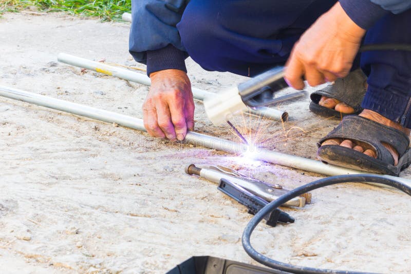Worker Welding the Steel without Safety Stock Photo - Image of light ...