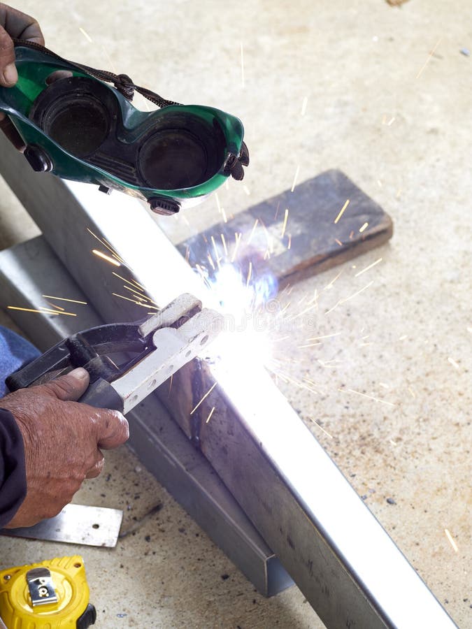 Workers Weld the Iron Together Stock Image - Image of mask, engineering ...