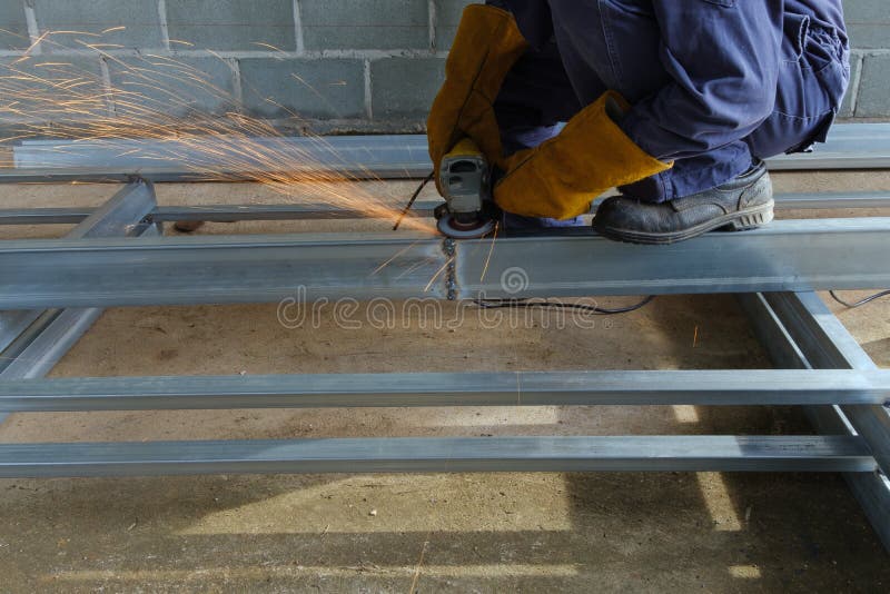 Worker Who are Using Grinding Tools . Stock Photo - Image of gloves ...
