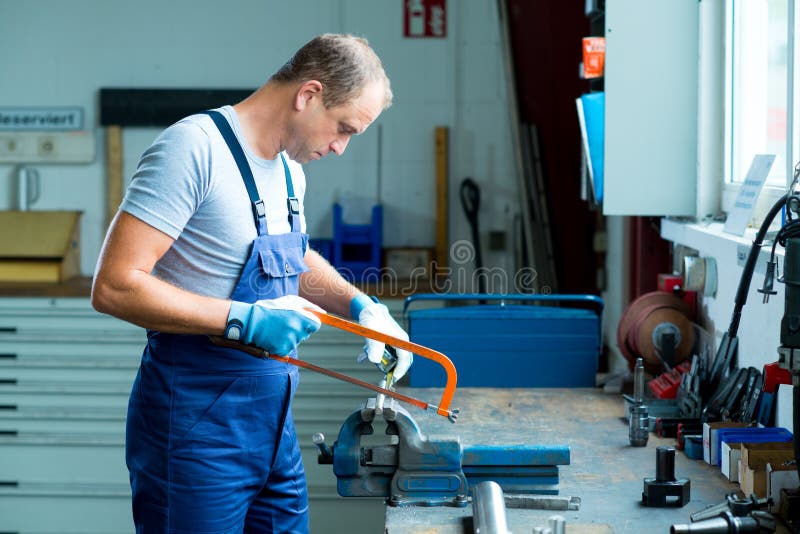 Worker on Work Bench in Factory Stock Image - Image of manufacturing ...