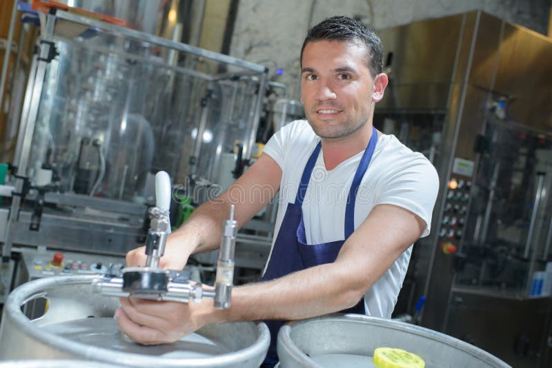 Worker Working with Beer Barrel at Brewery Stock Image - Image of ...