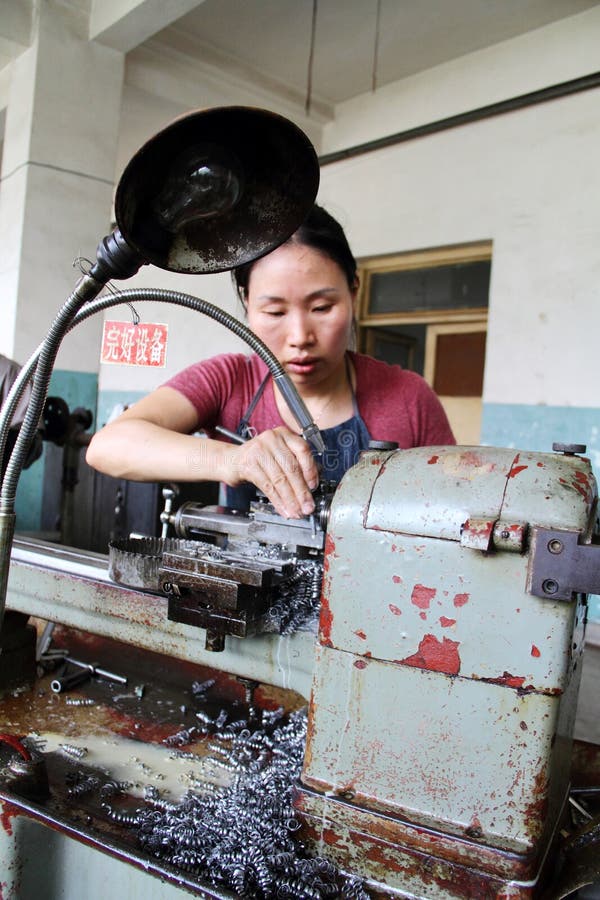 Worker Working in Chinese Factory Editorial Photo - Image of condition ...