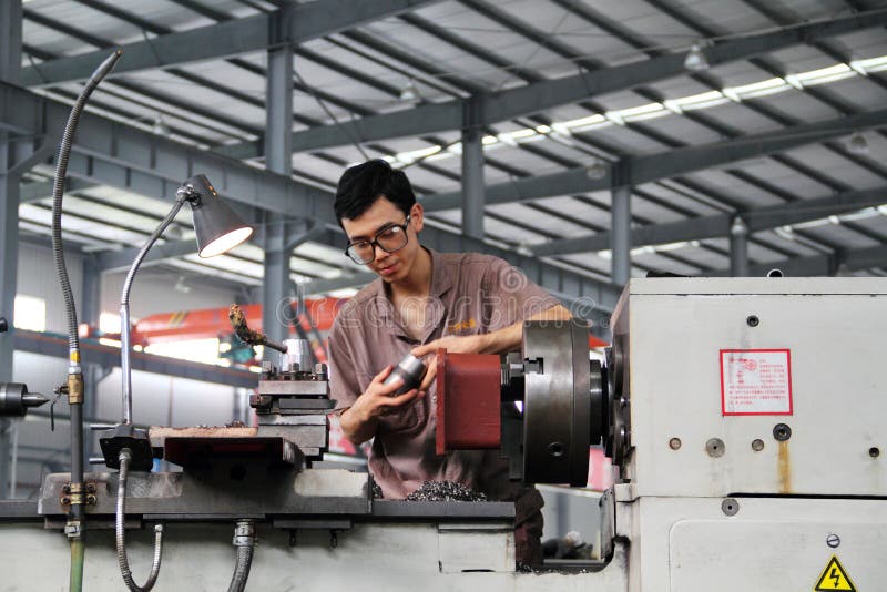 Worker Working in Chinese Factory Editorial Photo - Image of condition ...