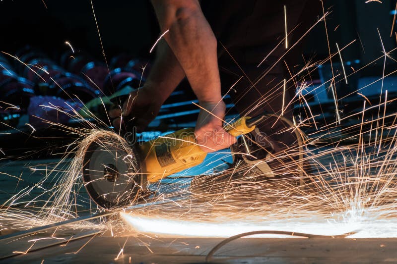Worker Working with a Circular Grinder Stock Image - Image of color ...