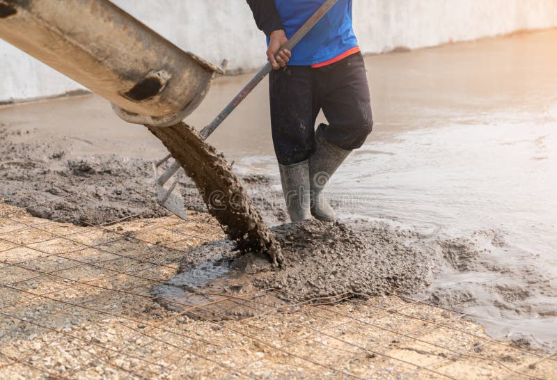 Worker Working for Concrete Pavement for Ground Road Stock Image ...
