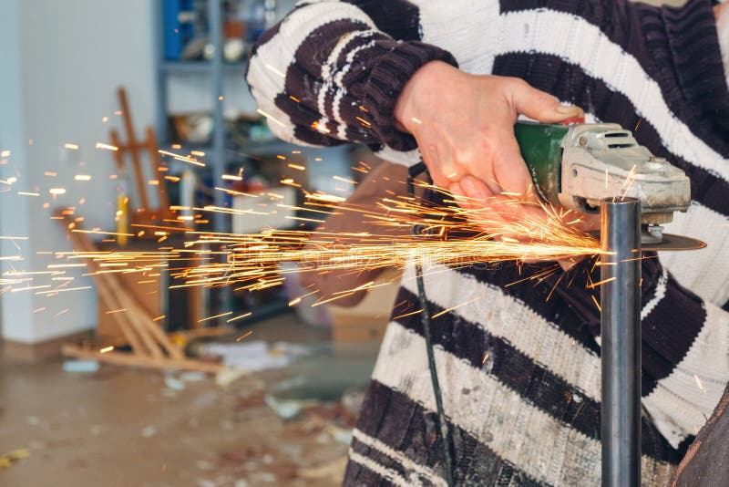 Worker Working with Hand Grinder Stock Photo - Image of hand, iron ...
