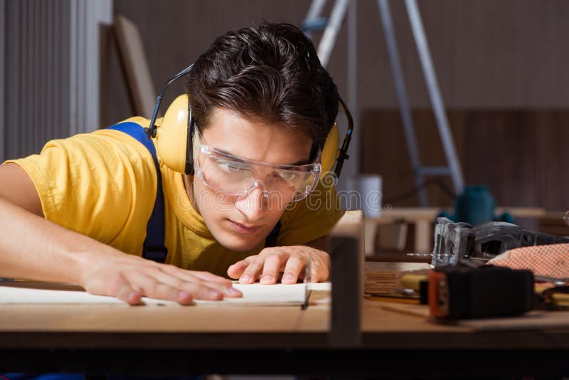 The Worker Working in Repair Workshop in Woodworking Concept Stock ...