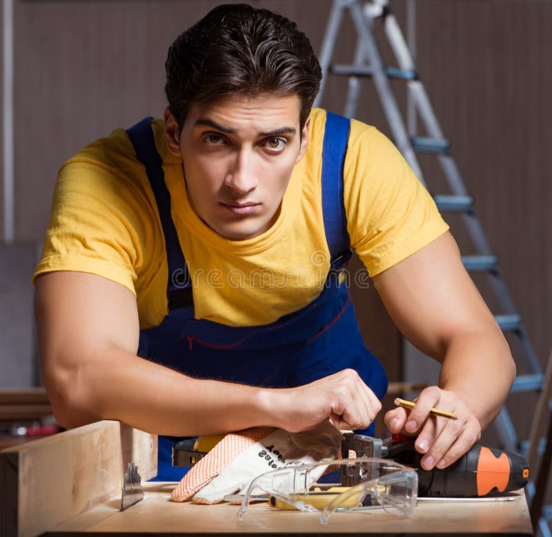 Worker Working in Repair Workshop in Woodworking Concept Stock Image ...