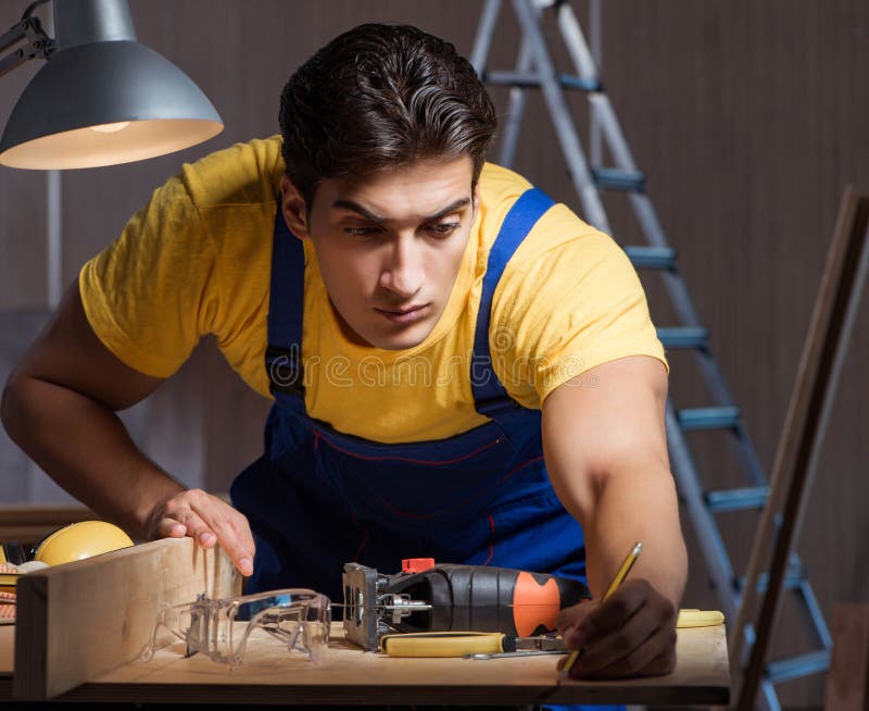 Worker Working in Repair Workshop in Woodworking Concept Stock Image ...