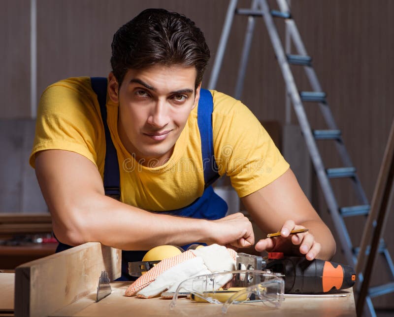 Worker Working in Repair Workshop in Woodworking Concept Stock Image ...