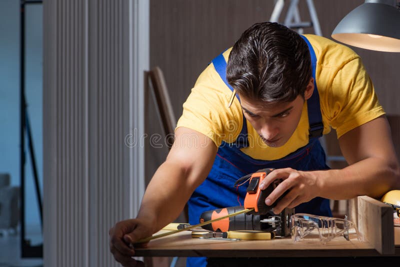 The Worker Working in Repair Workshop in Woodworking Concept Stock ...