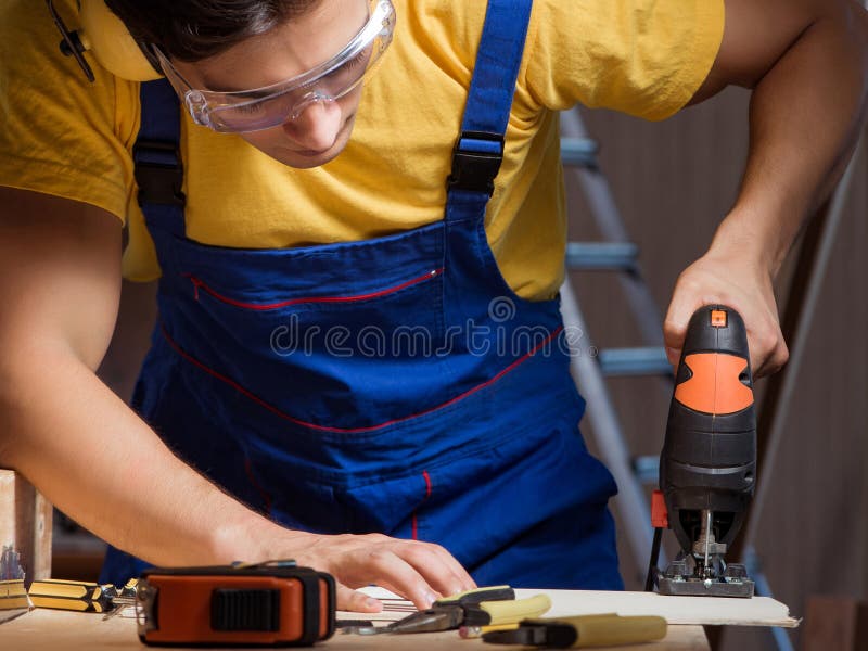 Worker Working in Repair Workshop in Woodworking Concept Stock Image ...