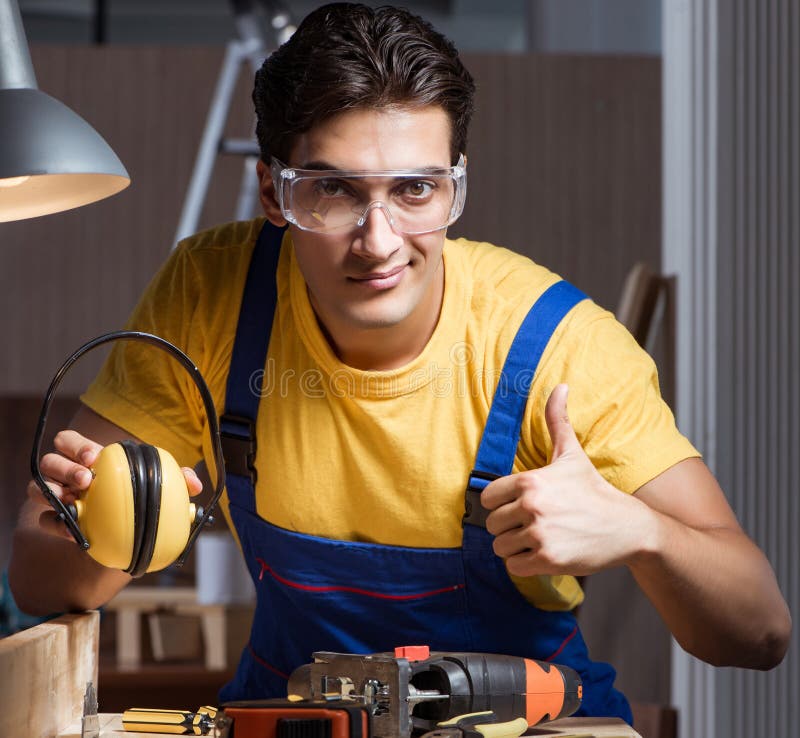 Worker Working in Repair Workshop in Woodworking Concept Stock Image ...