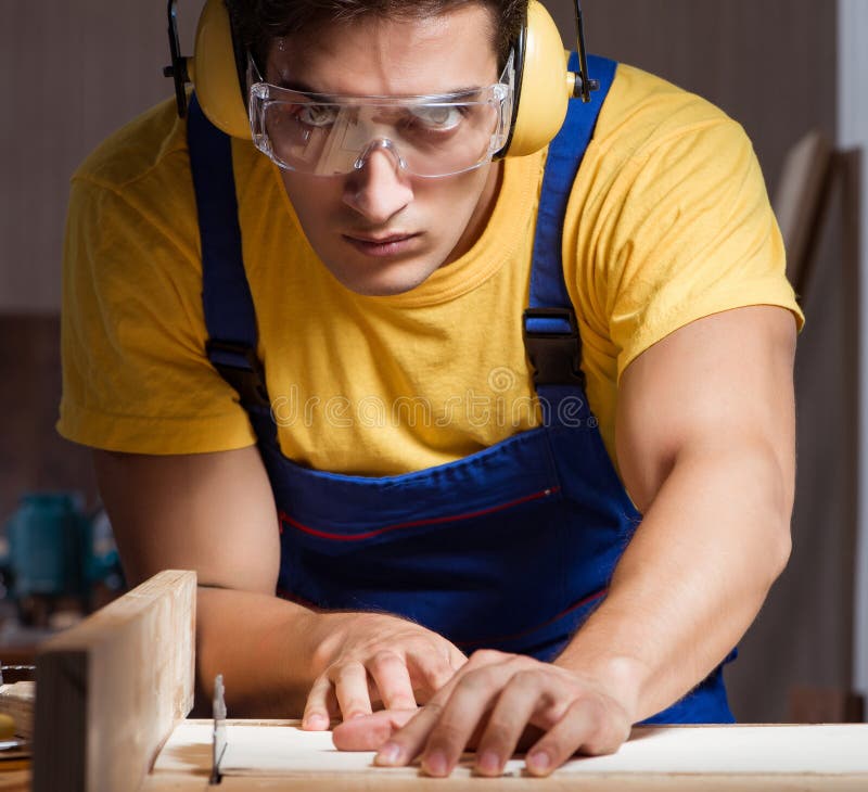 Worker Working in Repair Workshop in Woodworking Concept Stock Image ...