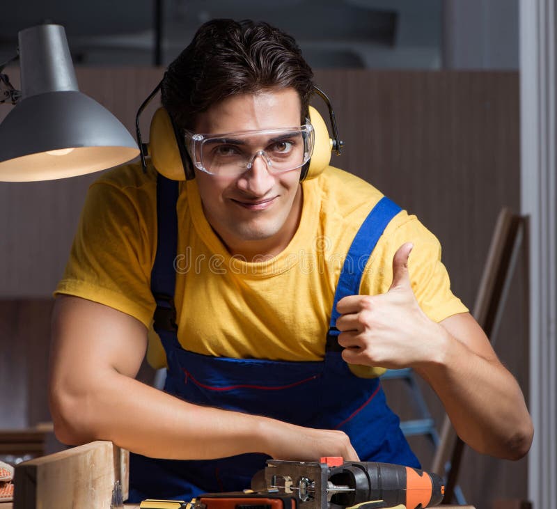 Worker Working in Repair Workshop in Woodworking Concept Stock Image ...