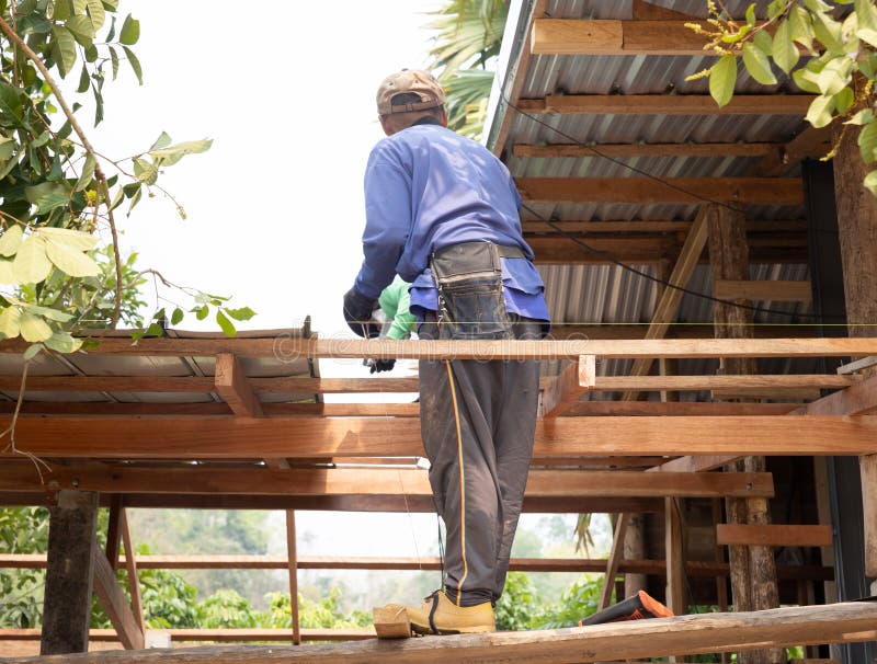 Worker Working in Roof Construction Work Editorial Image - Image of ...