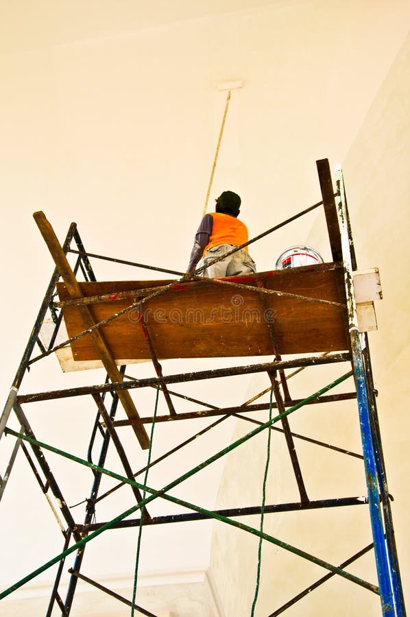 Worker working on scaffold stock photo. Image of platform - 46127816