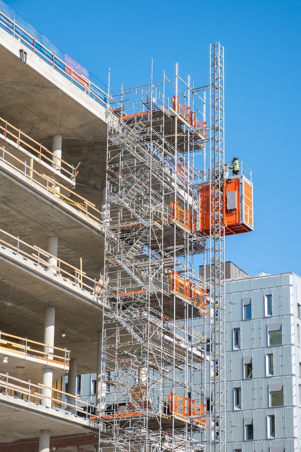 Worker Working on Structure of Scaffolding Stock Photo - Image of pole ...