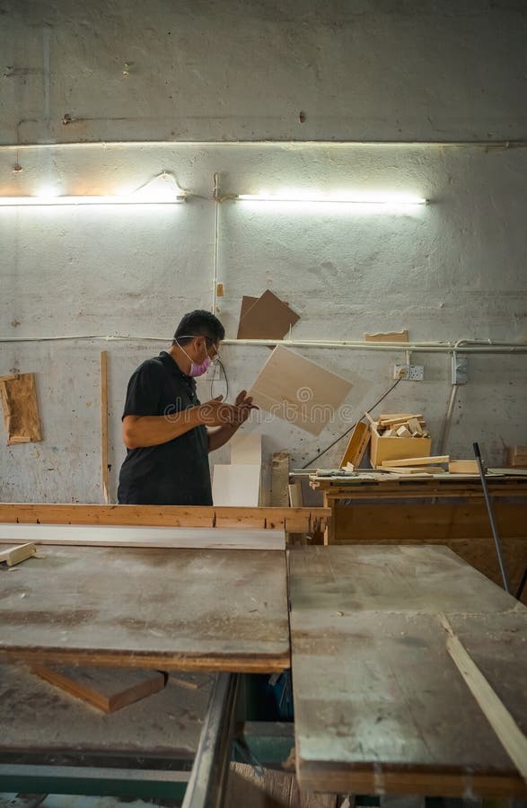 Worker Working at the Workshop with Face Mask on Stock Photo - Image of ...