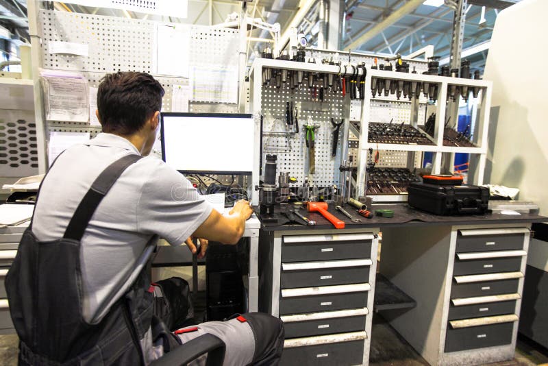 Worker at Workplace with Computer and Tools Stock Photo - Image of ...