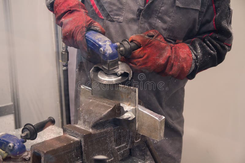 Worker Works with the Grinding Machine Stock Photo - Image of industry ...