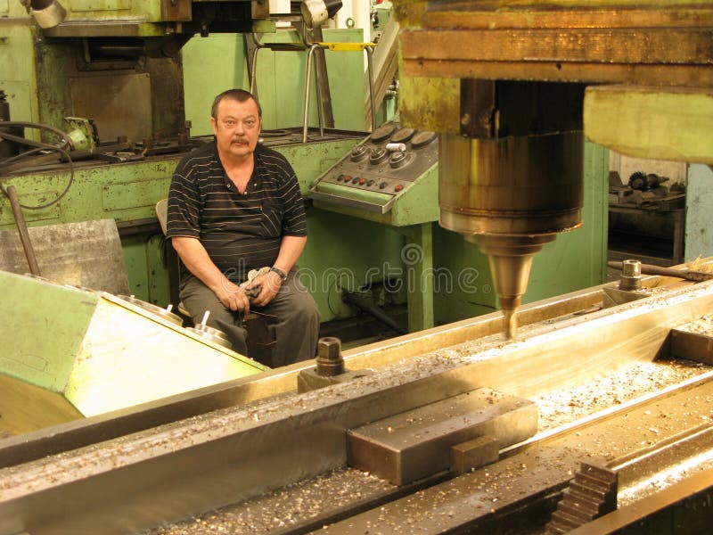 A Worker Works on a Lathe in a Soviet Era Machine Shop Editorial ...