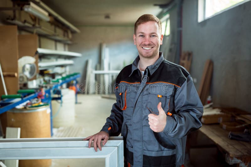 Worker in Workshop for Manufacture of Windows and Doors Stock Photo ...