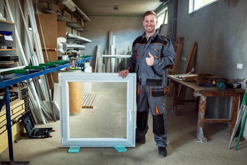 Worker in Workshop for Manufacture of Windows and Doors Stock Image ...