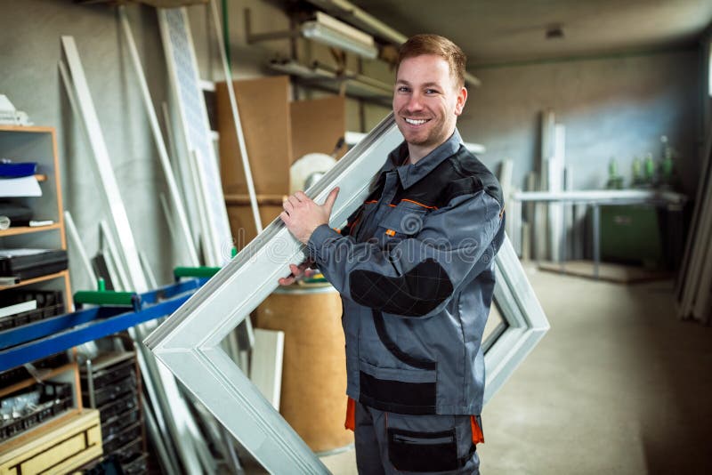 Worker in Workshop for Manufacture of Windows and Doors Stock Photo ...