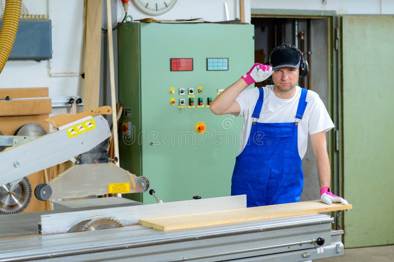 Worker in Workshop Using Saw Machine Stock Image - Image of furniture ...