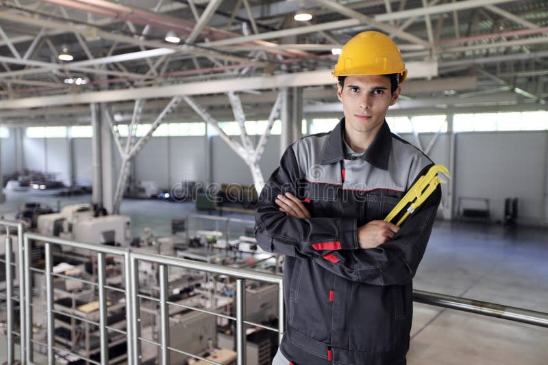 Worker with Wrench at Factory Stock Photo - Image of engineer ...